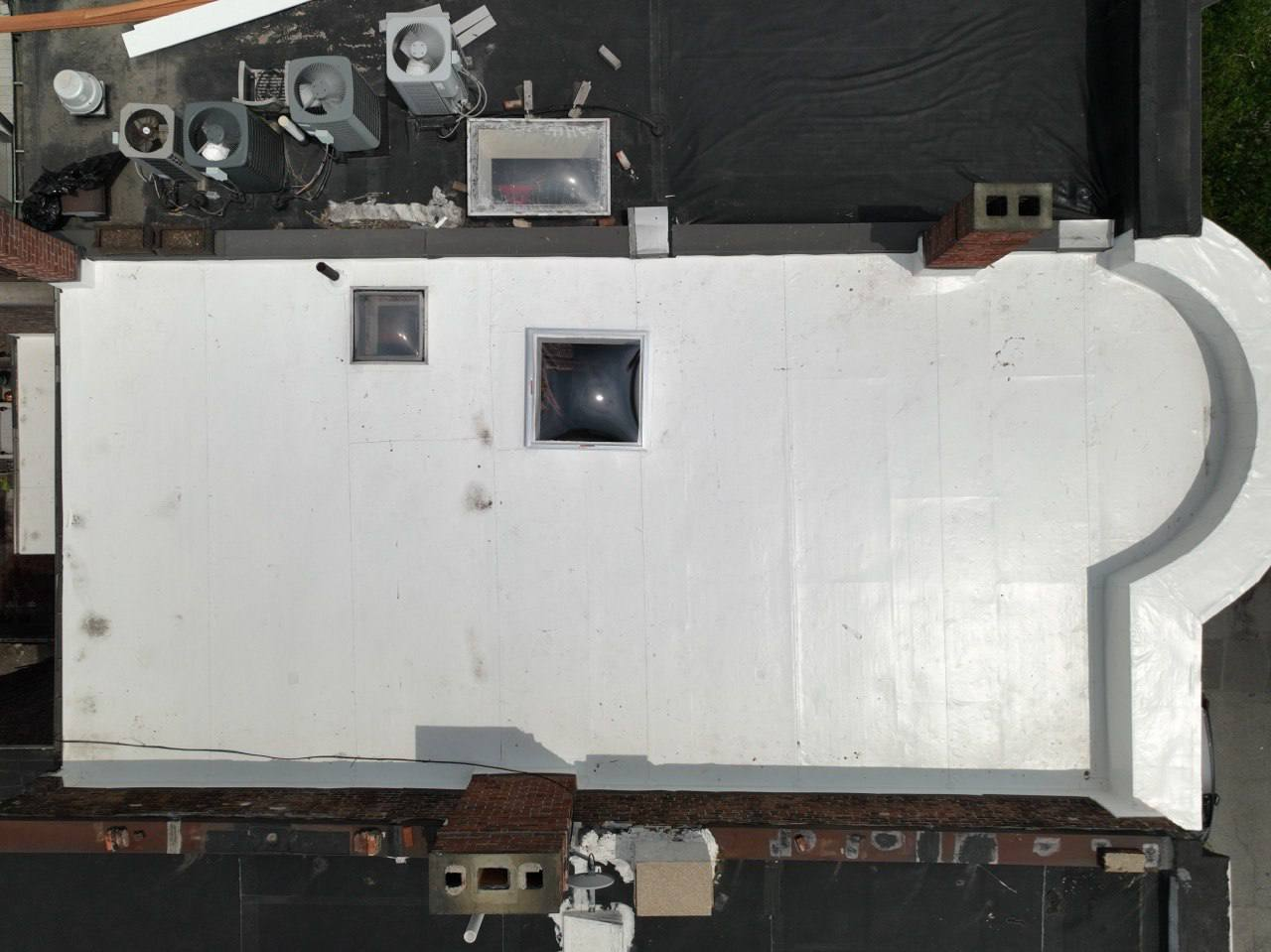 Replacing a Tar and Gravel Roof with a Modern PVC Solution in Downtown ...